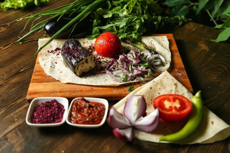 Grilled Eggplant and Flatbread with Tomato and Onion Salad Stock Image ...