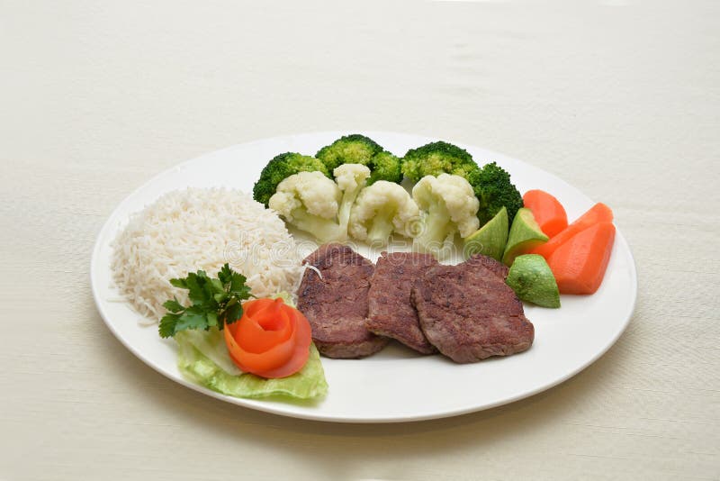 Grilled Fillet Steak with White Rice and Vegetable Salad Stock Photo ...
