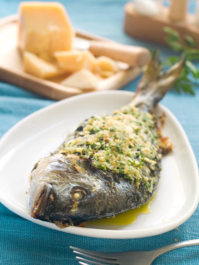 Grilled fish stock image. Image of fork, food, paper - 26414775