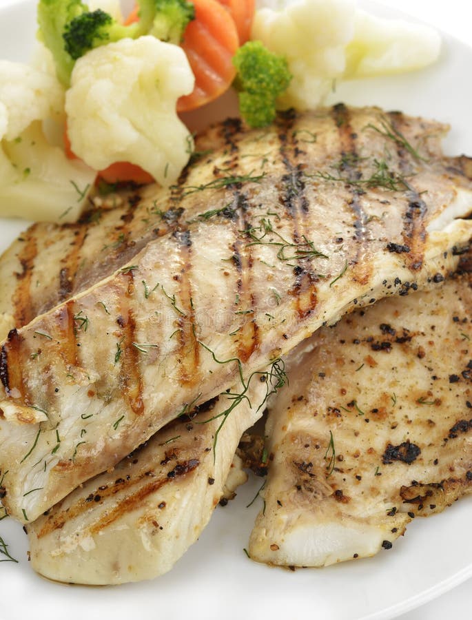 Grilled Fish stock image. Image of plate, fish, cooked - 27498015