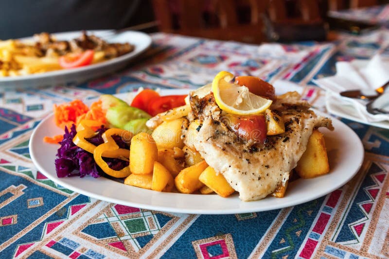 Grilled Fish with Apple and Vegetable Stock Photo - Image of meal ...
