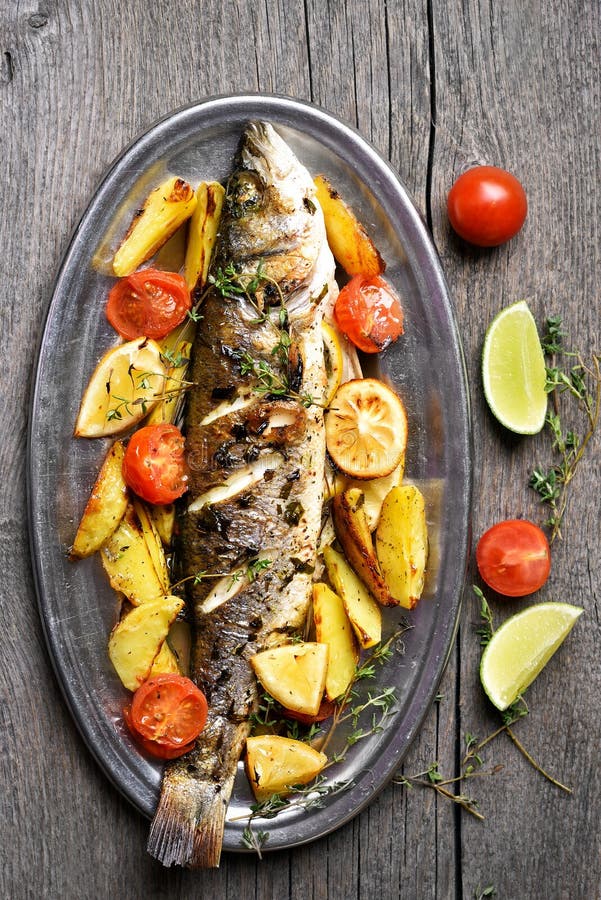Grilled Fish with Baked Potato Wedges Stock Photo - Image of lunch ...