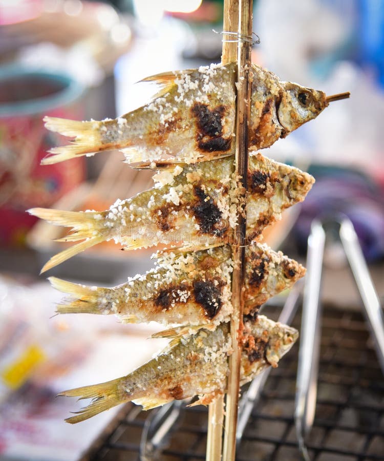 Grilled fish with bamboo stock image. Image of natural - 121683777