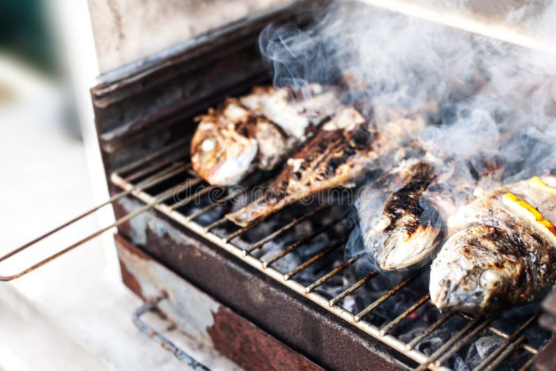 Grilled Fish Barbecue with Spices on the Grill Close Up Stock Photo ...