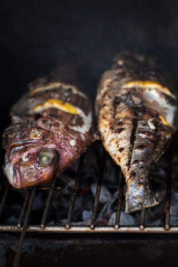 Grilled Fish Barbecue with Spices and Lemon on the Grill Close U Stock ...