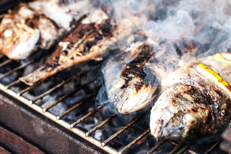 Grilled Fish Barbecue with Spices and Lemon on the Grill Close U Stock ...