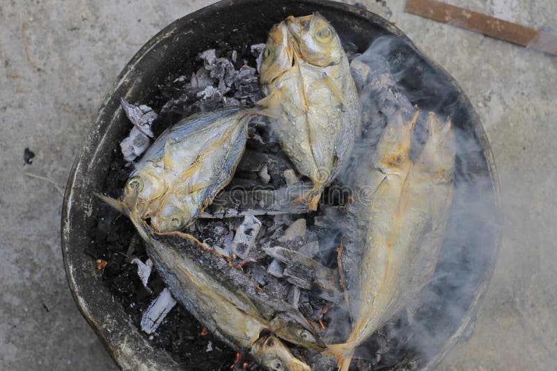 A Grilled Fish Being Grilled in the Shell. Stock Image - Image of ...