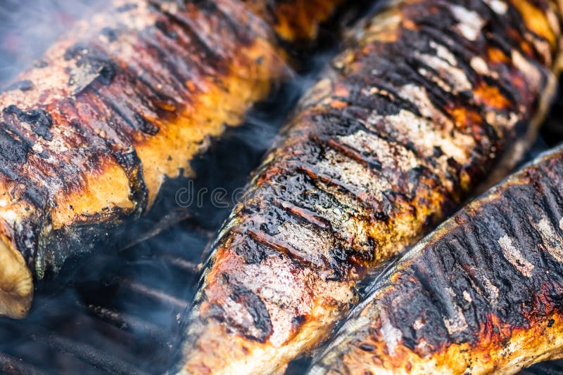 Grilled Fish on Charcoal Grill. Fresh Fish Barbecue Stock Image - Image ...