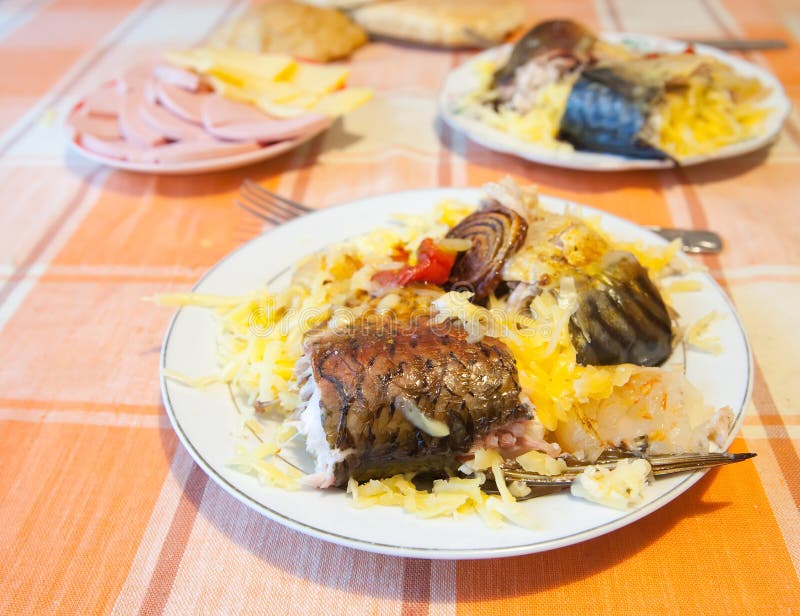 Grilled fish with cheese stock image. Image of scomber - 11240593
