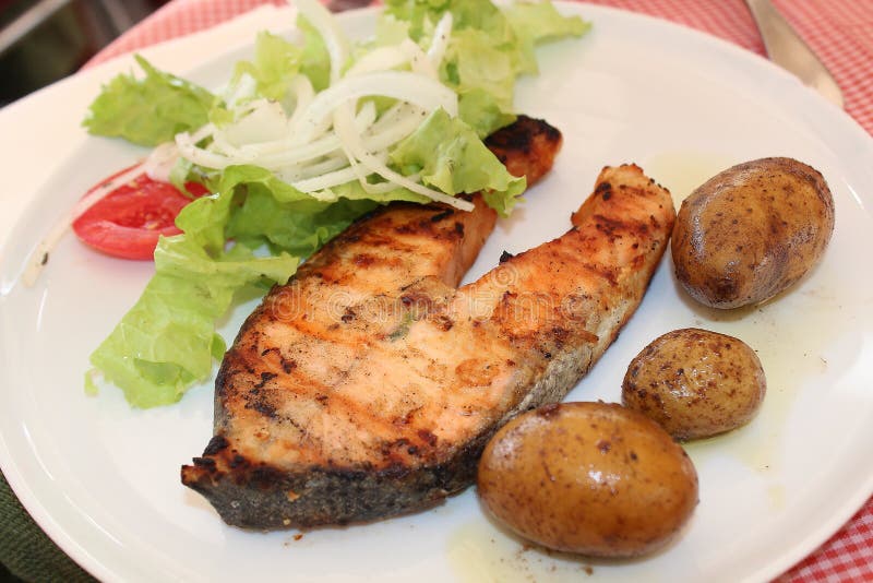 Grilled fish dinner stock image. Image of buffet, fried - 57587111