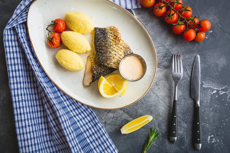 Grilled Fish Dish on a Plate with Lemon Slice Stock Image - Image of ...