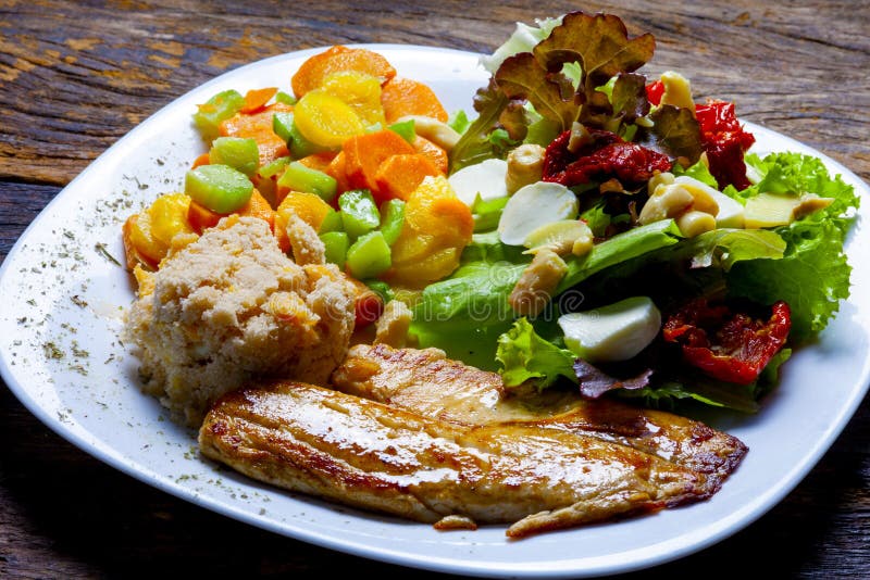 Grilled Fish Fillet with Salad Vegetables Stock Photo - Image of fillet ...