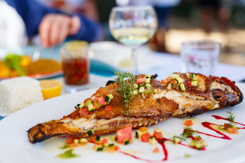 Grilled fish lunch stock photo. Image of white, outdoor - 123071128