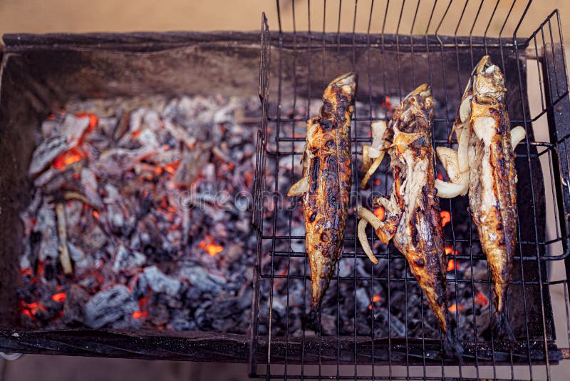 Grilled Fish with Spices on Fire Stock Photo - Image of burn, fresh ...