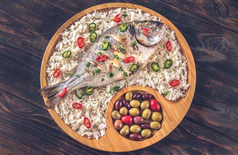 Grilled fish with rice stock image. Image of chili, fried - 216742357