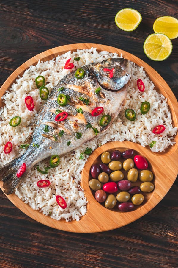 Grilled fish with rice stock image. Image of baked, mediterranean ...