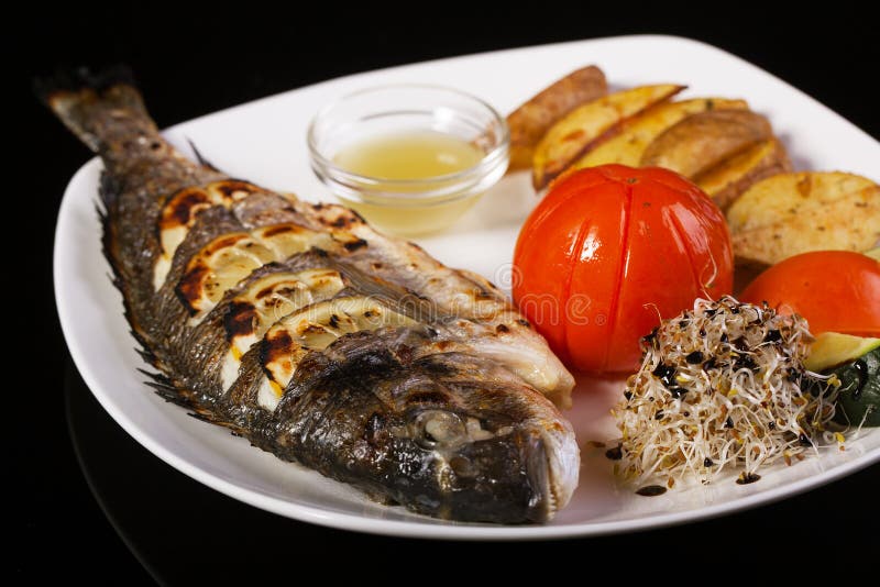 Grilled Fish Sea Bream on Barbecue Stock Photo - Image of lunch ...