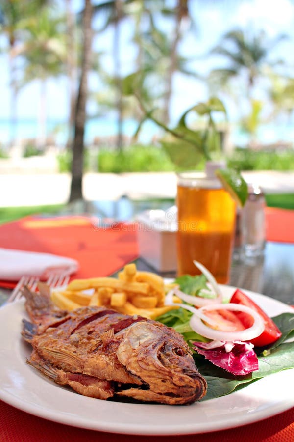 Grilled Fish with Vegetables Served in Beach Restaurant Stock Photo ...