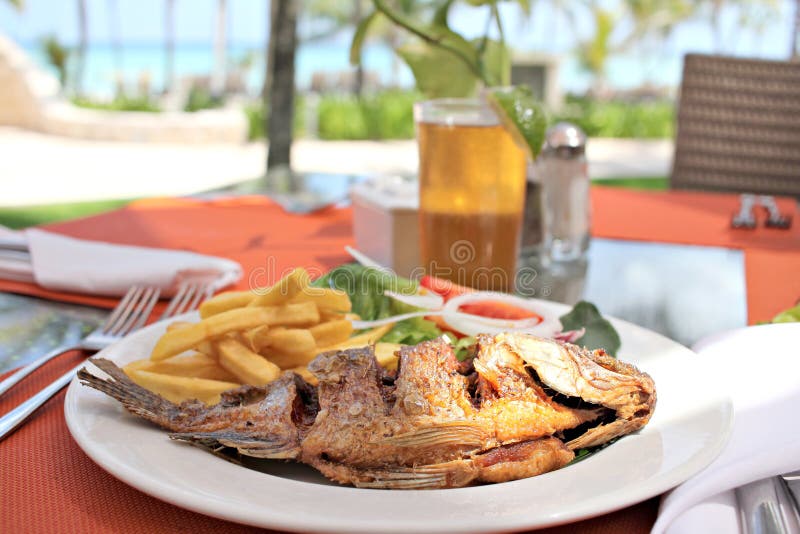 Grilled Fish with Vegetables Served in Beach Restaurant Stock Photo ...