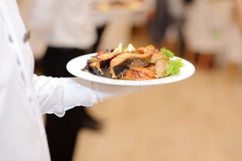Waiter with Fish Plate stock image. Image of industry - 30614093
