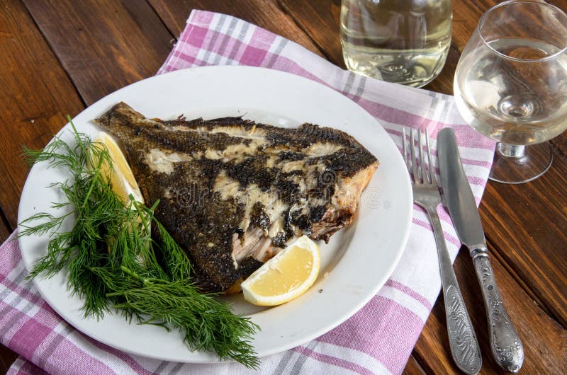 Grilled Flounder on the White Plate Stock Photo - Image of fish ...