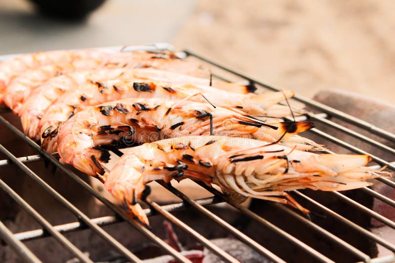 Grilled Fresh Prawns on Flaming Seafood Stock Photo - Image of prawns ...