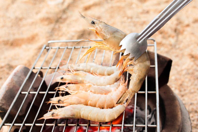 Grilled Fresh Prawns on Flaming Seafood Stock Photo - Image of scampi ...