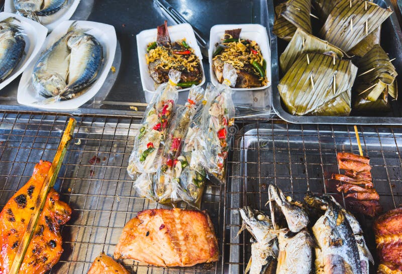 Grilled or Fried Salmon Steak and Green Salad, Lemon, Tomato, Sauce ...