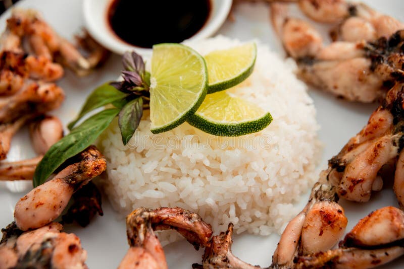 Grilled Frog Legs on the White Plate Stock Photo - Image of refreshment ...