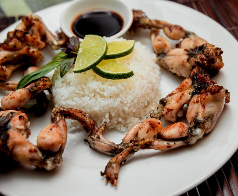 Grilled Frog Legs on the White Plate Stock Image - Image of fruits ...