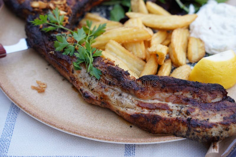Grilled Giant Pork Chop with Chips and Salad Stock Image - Image of ...