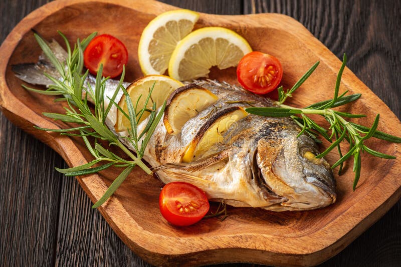 Grilled Gilt-head Bream with Lemon. and Rosemary Stock Image - Image of ...