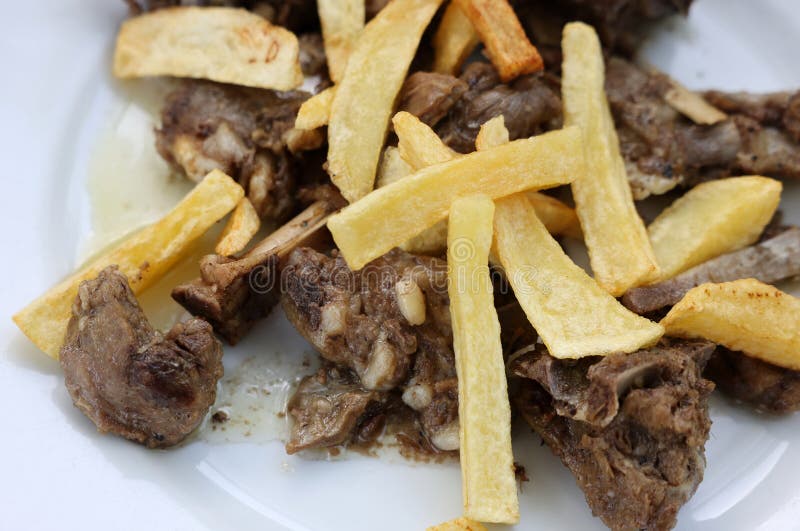 Grilled Goat with Fries on a White Plate. Stock Photo - Image of fries ...