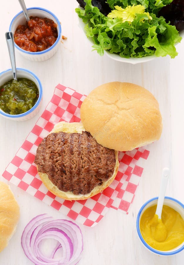 Grilled Hamburger with Condiments Stock Photo - Image of studio ...