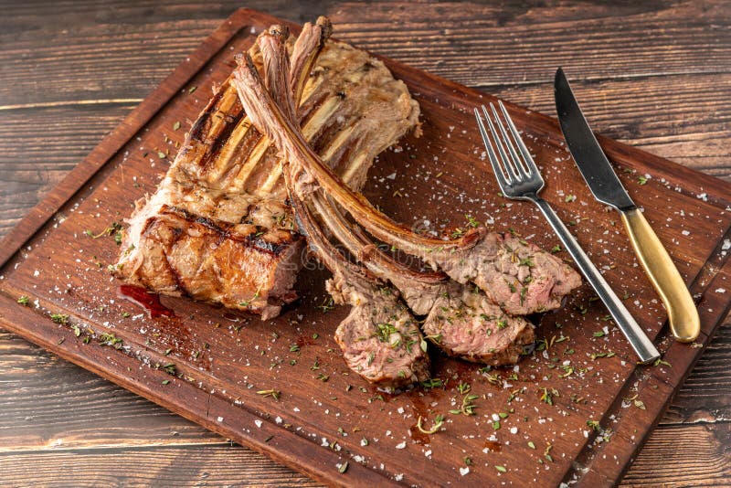 Grilled Lamb Chops on a Wooden Serving Plate Stock Image - Image of ...