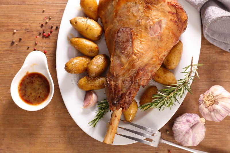 Grilled lamb leg stock photo. Image of dining, lamb - 141774164