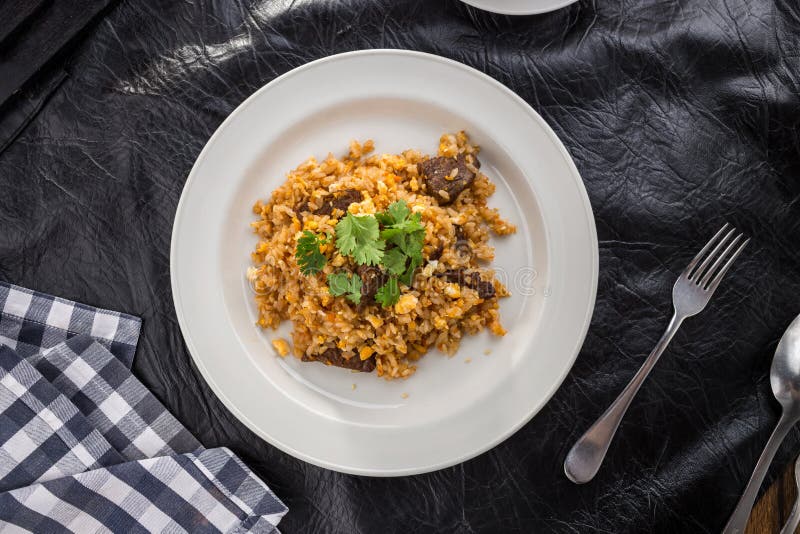 Grilled Lamb with Saffron Rice on Black Table Stock Photo - Image of ...