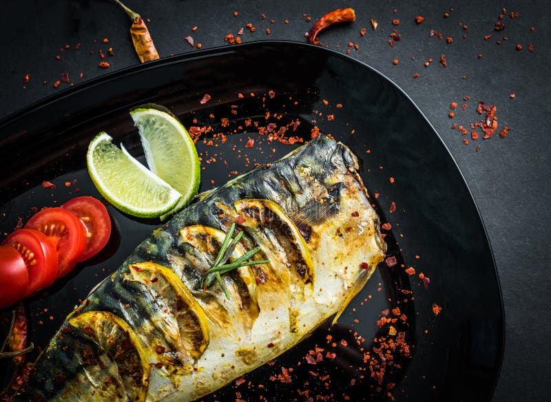 Grilled mackrel fillets stock photo. Image of dinner - 148340658
