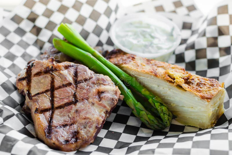 Grilled Marinated Lamb T-bones with Cucumber Raita Stock Photo - Image ...