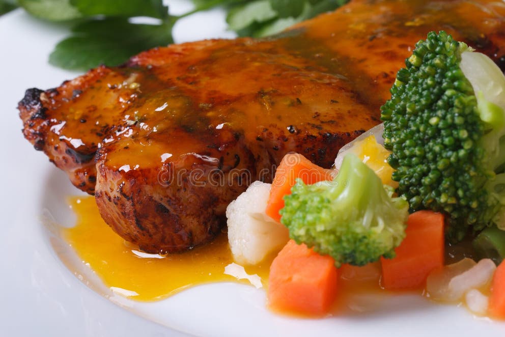 Grilled Meat with Orange Sauce and Vegetables Stock Image - Image of ...