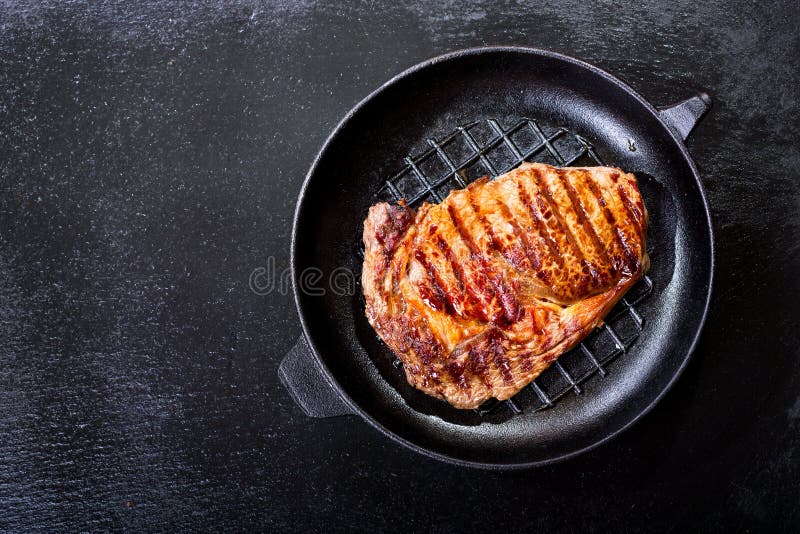 Grilled meat in a pan stock image. Image of steak, barbecue - 68970399