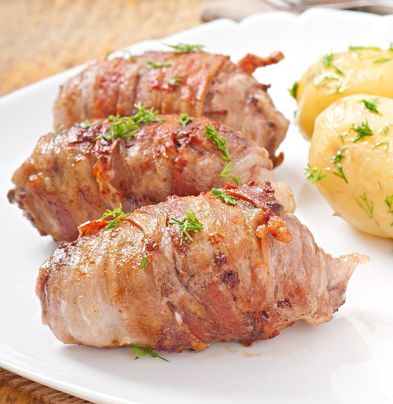 Grilled Meat Rolls Wrapped in Strips of Bacon Stock Photo - Image of ...
