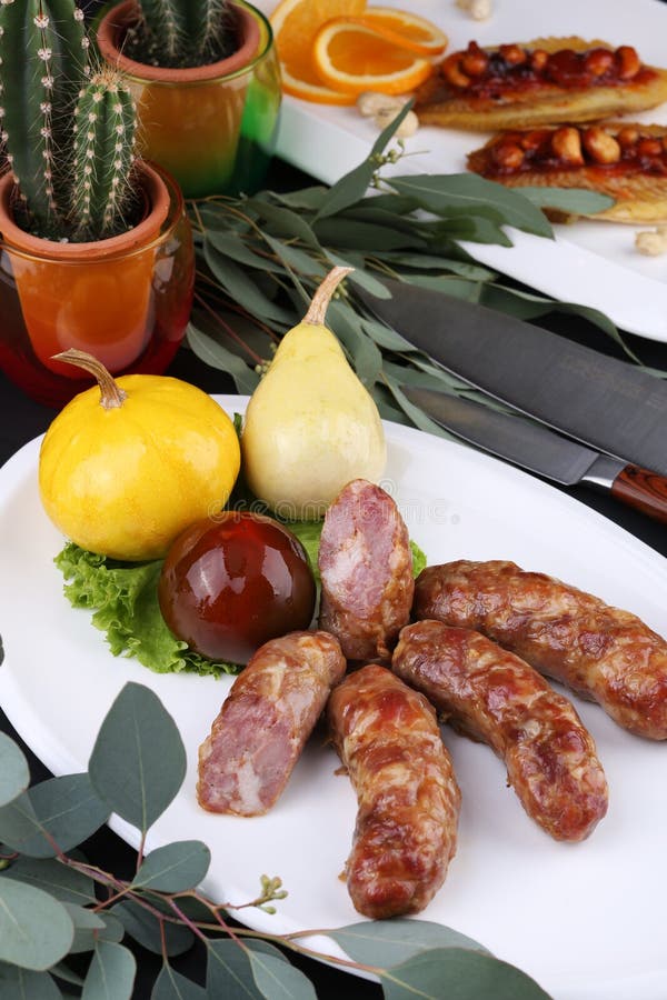 Grilled Meat Sausages and Exotic Vegetables on White Plate Stock Image ...