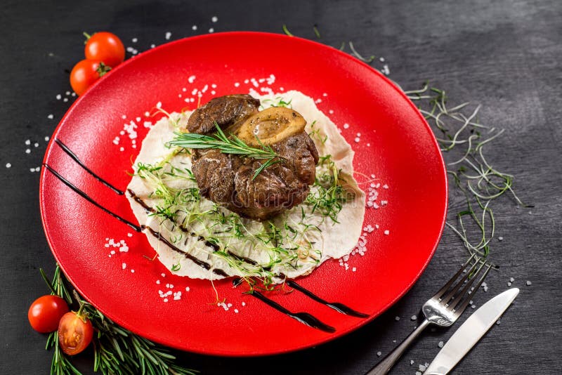 Grilled Meat Steak on Pita Leaf in a Red Plate Stock Image - Image of ...