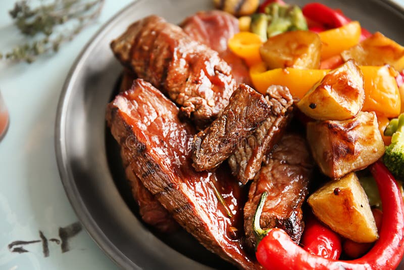 Grilled Meat with Vegetables on Table, Closeup Stock Image - Image of ...
