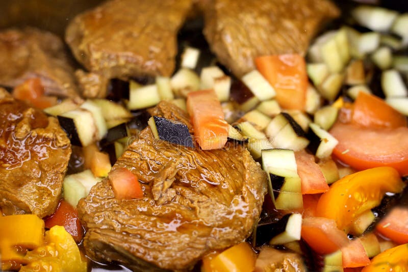 Grilled Meat with Yellow and Red Vegetables Stock Photo - Image of salt ...