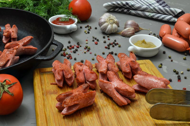 Grilled Mini Sausages. Mini Sausages in a Pan Stock Image - Image of ...