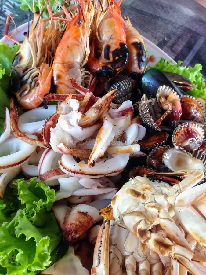 Grilled mixed seafood stock photo. Image of burned, foodstuff - 68888238