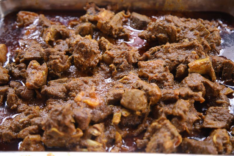 Grilled Mutton in a Serving Plate on a Wooden Table with a Black ...