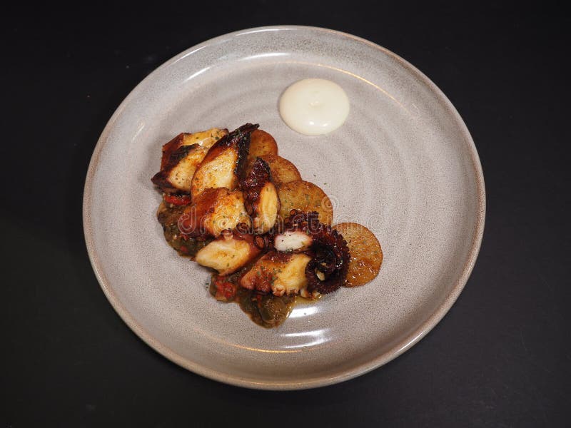 Grilled Octopus Leg with Roasted Vegetables Served in a Dish Isolated ...